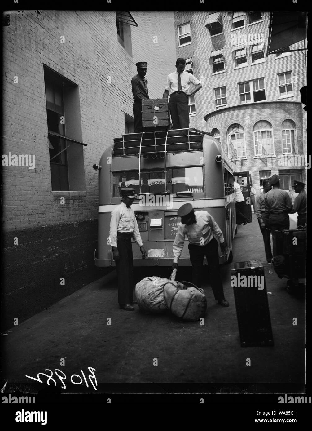 Bus transportation loading baggage Stock Photo - Alamy