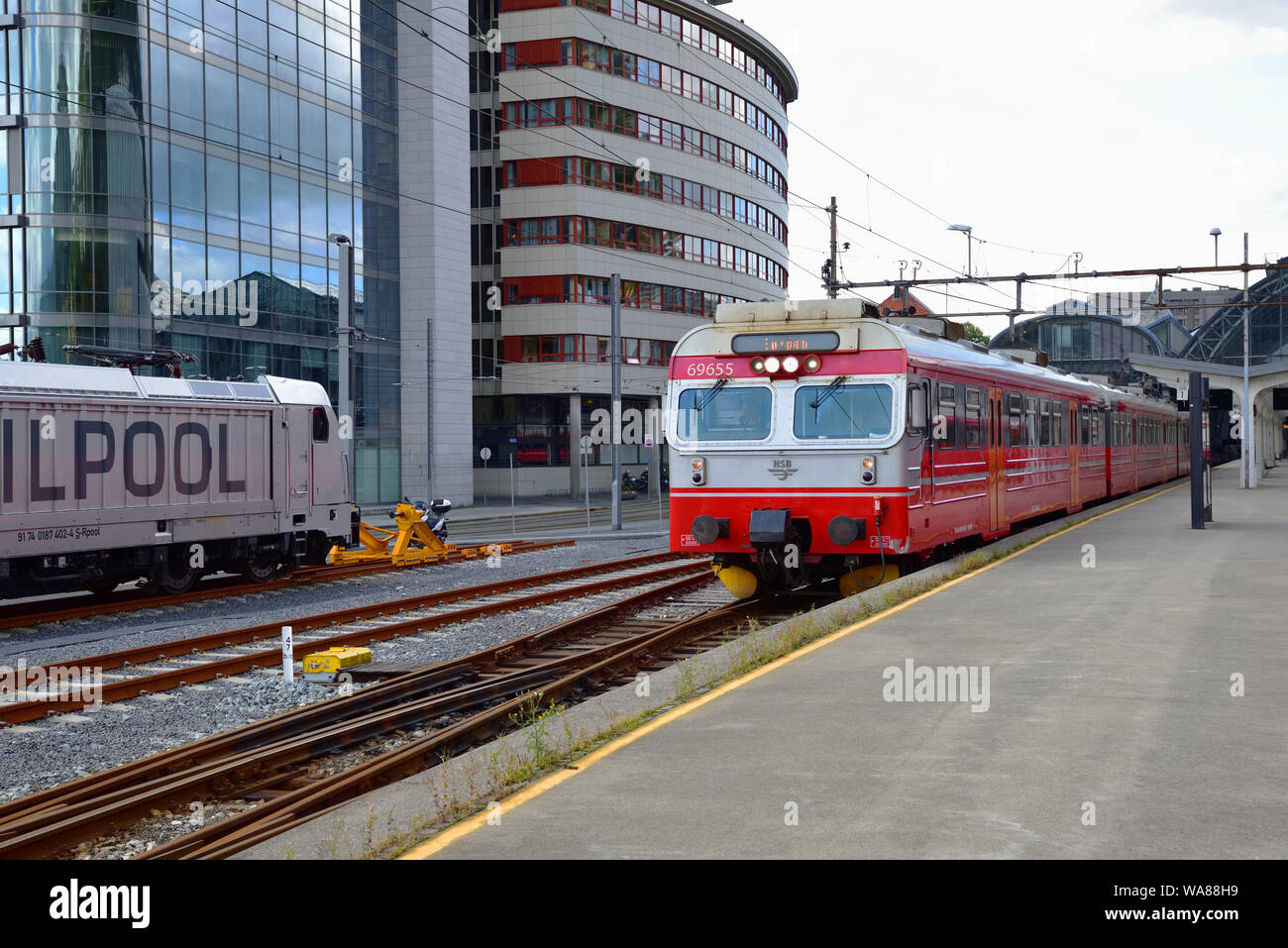 NSB Class 69 electric multiple unit 69655 leaves Bergen Central Station on a local service Stock ...