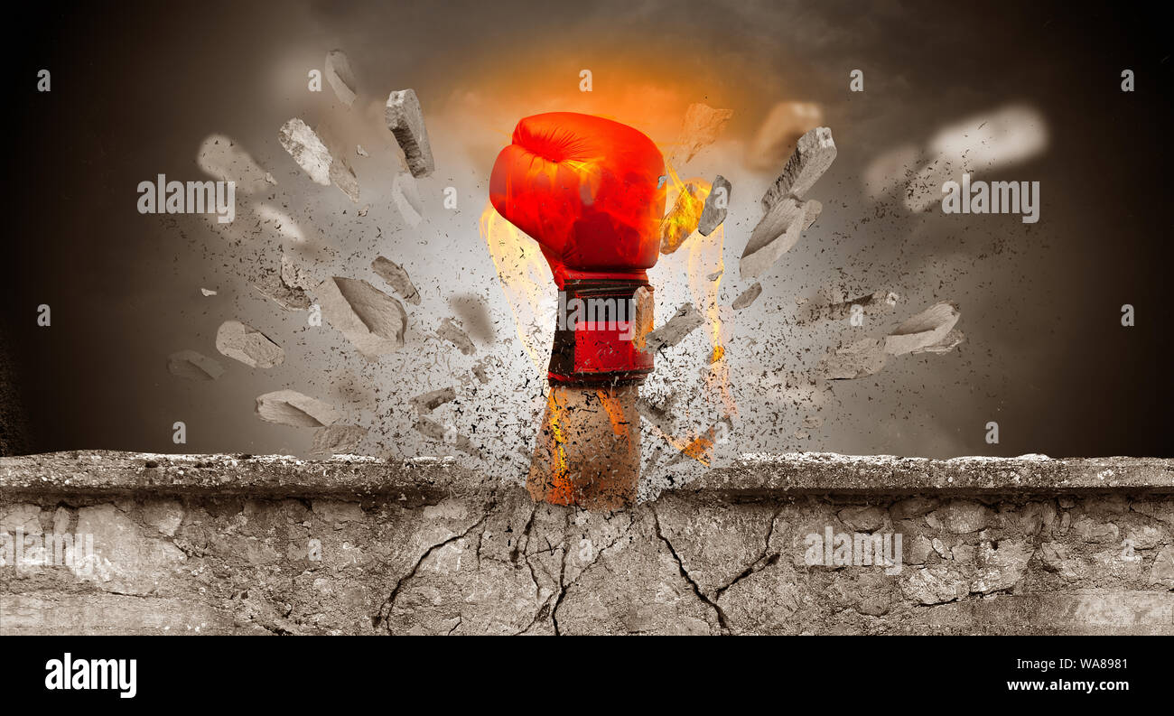 Big hand hits intense and breaks a crass stonewall Stock Photo - Alamy
