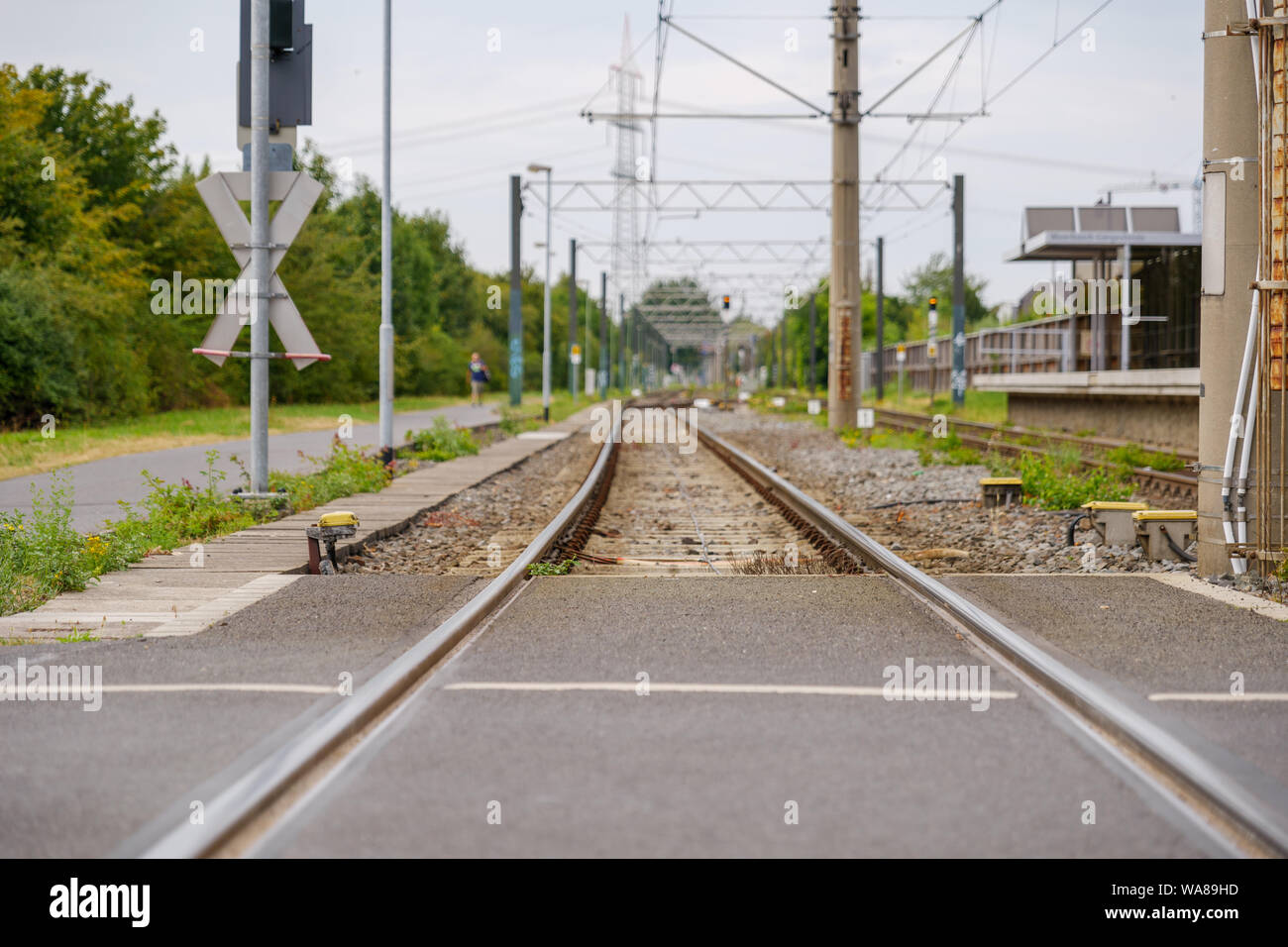 Close up view of empty railway track near platform train station in ...