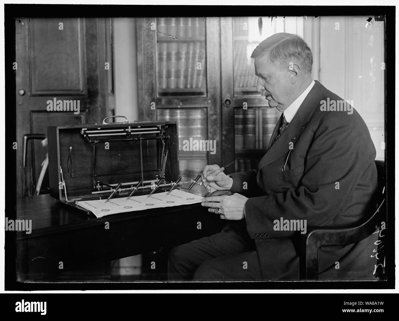 Check signing machine Cut Out Stock Images & Pictures - Alamy