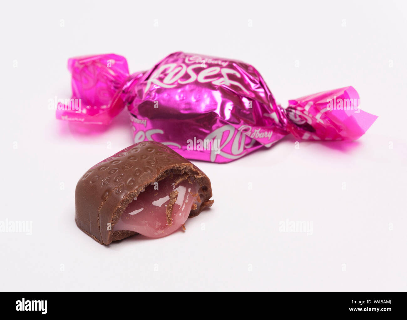 Strawberry flavour Cadburys Roses chocolate Stock Photo - Alamy