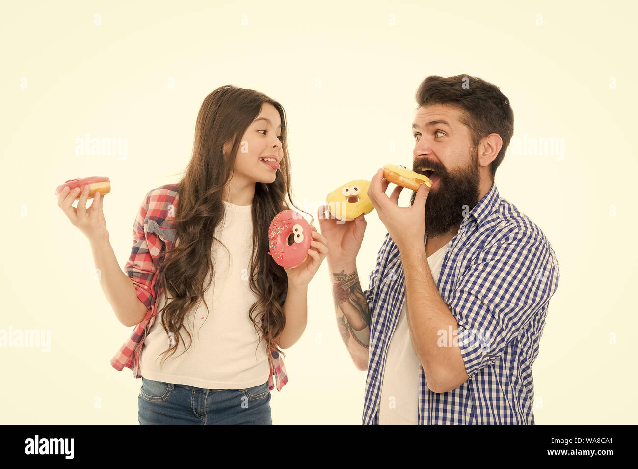 Perfect for dads with sweet tooth. Girl child and dad hold colorful ...