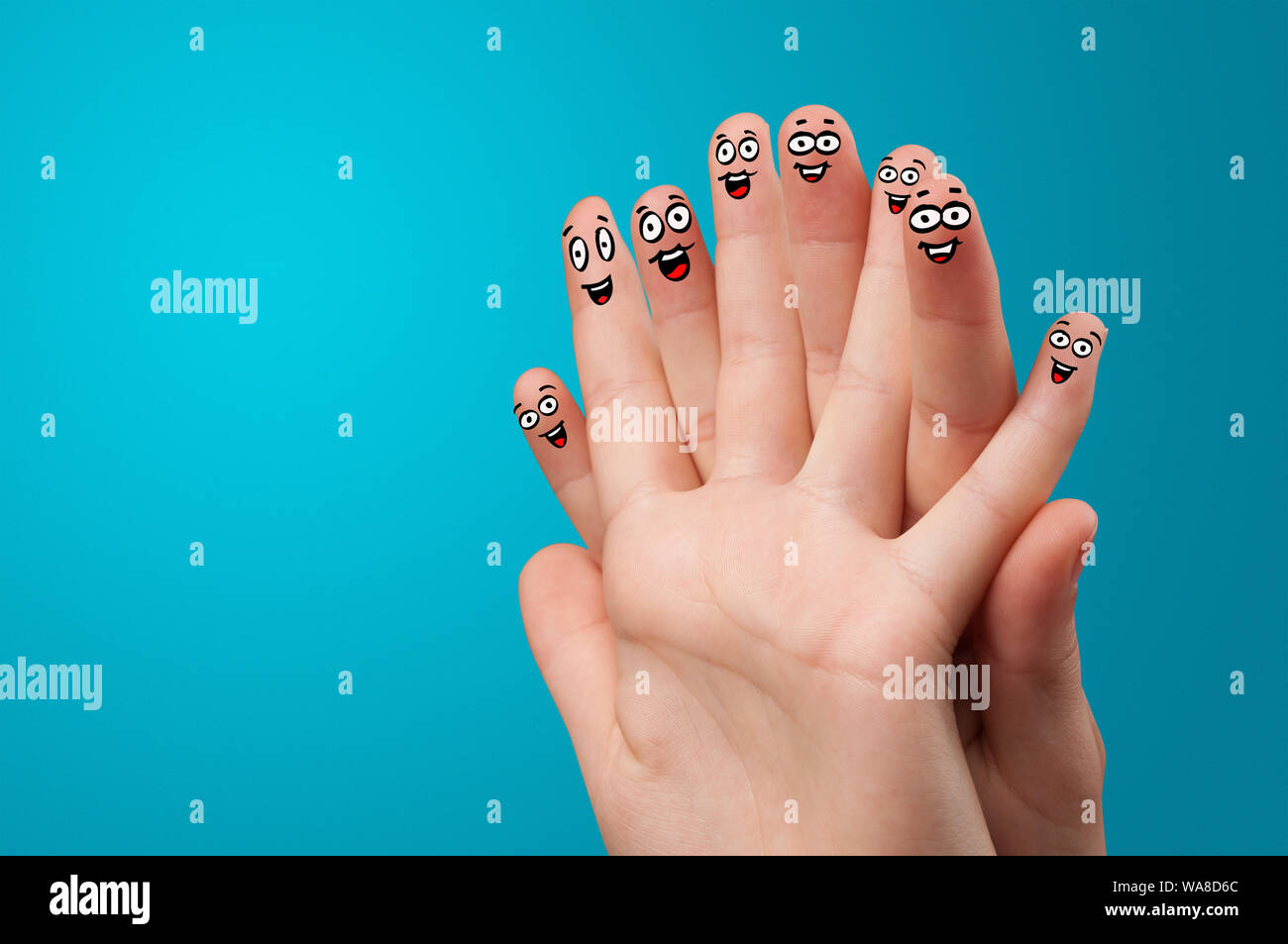 Happy face fingers hug each other Stock Photo - Alamy