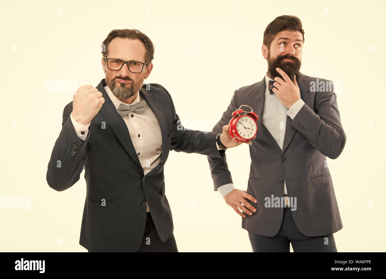 Punish for not punctuality. Business people formal clothes having ...