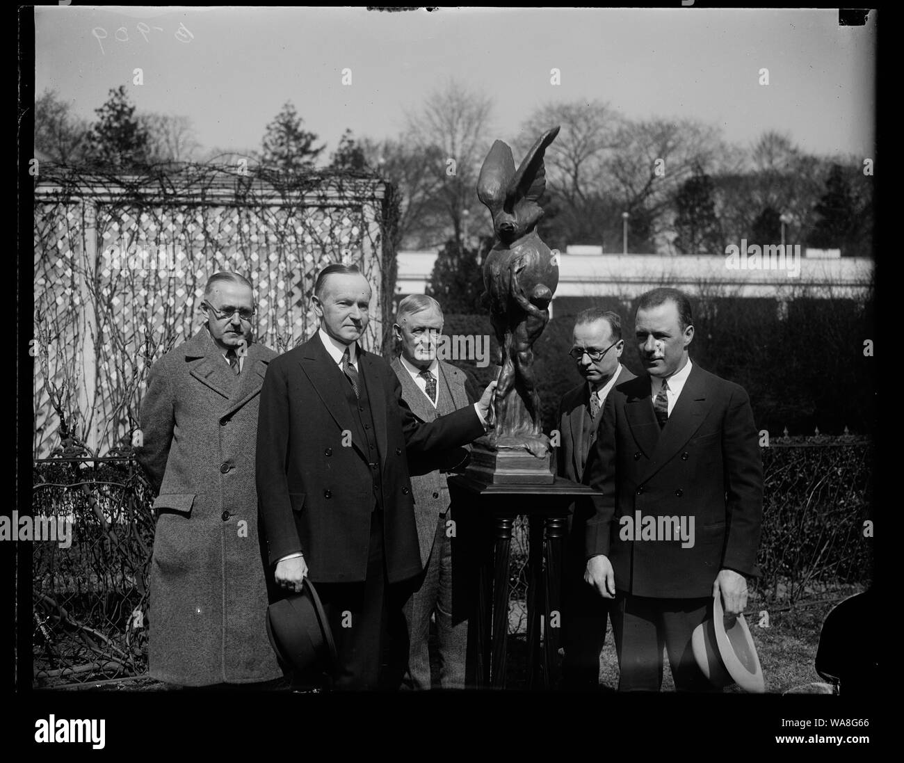 Calvin Coolidge and Harry S. New and group with statue outside White ...