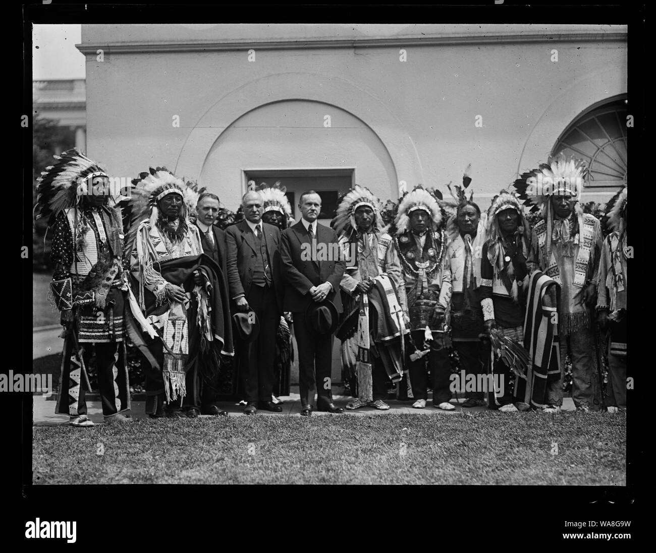 Calvin Coolidge and group of Native Americans outside White House ...