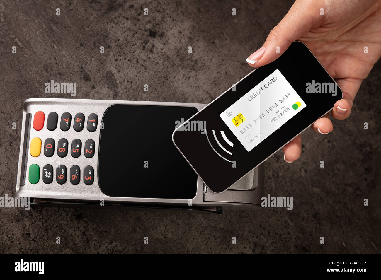 Transaction completed on terminal with mobile credit card Stock Photo ...
