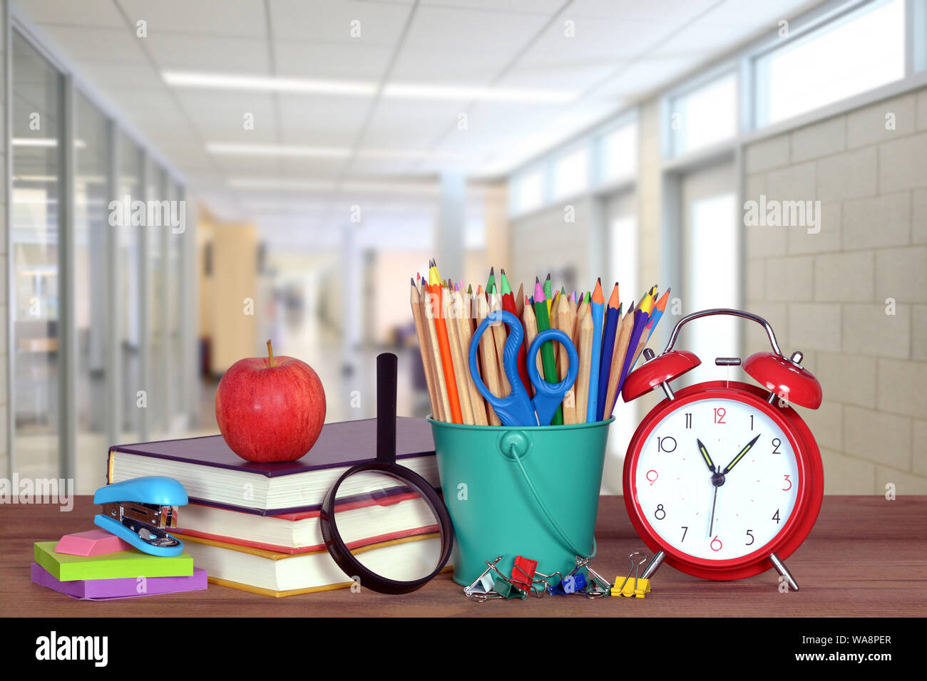 Back To School concept with book and blurry school hall background ...