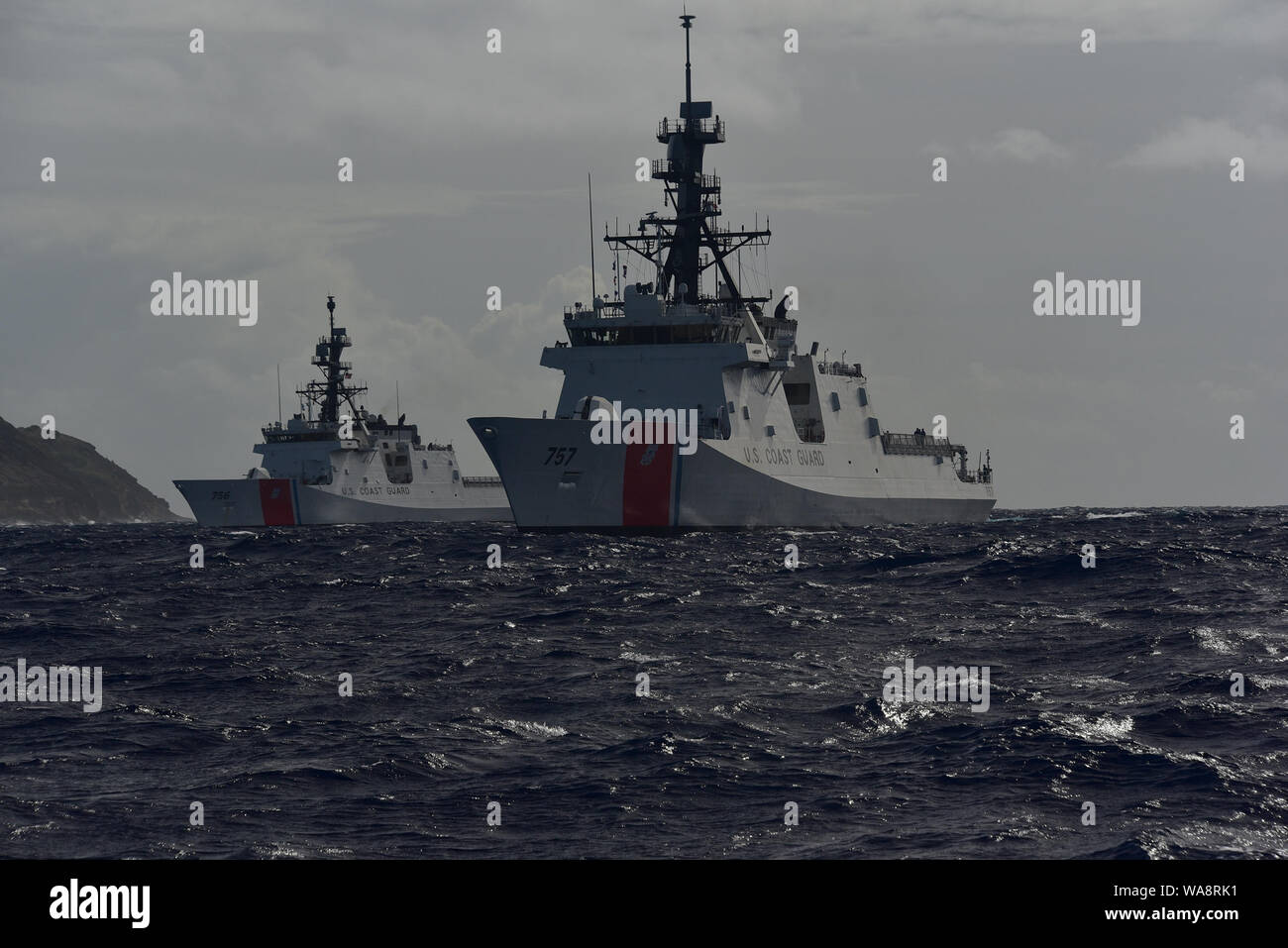 Coast Guard Cutter Midgett (WMSL 757), right, moves through Pacific ...