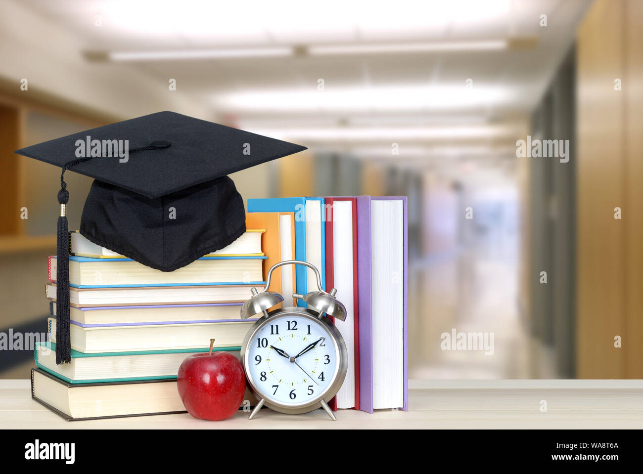 very blurry school hall background and book for education concept Stock ...