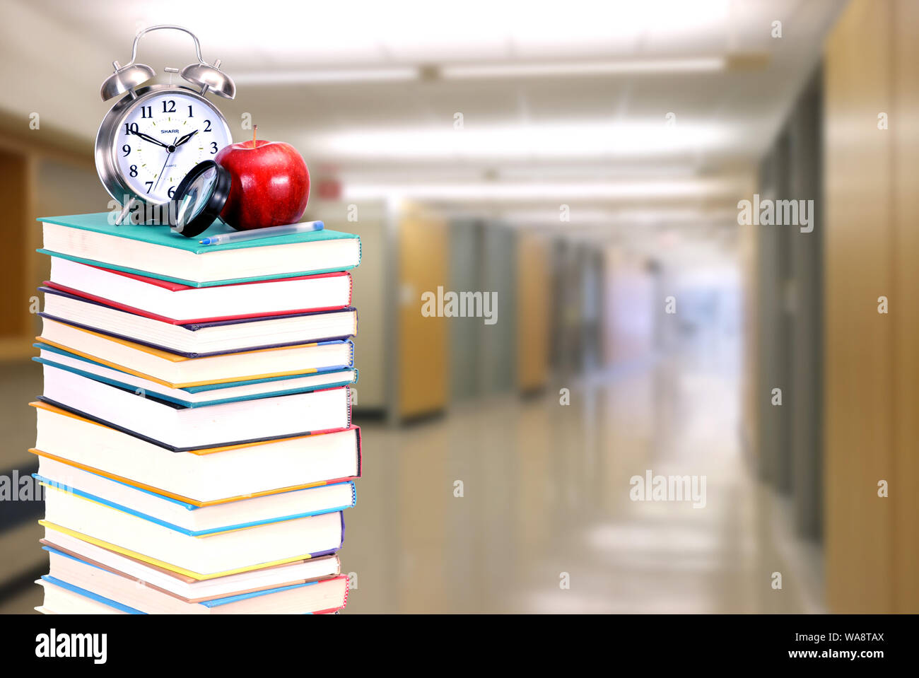 very blurry school hall background and book for education concept Stock ...