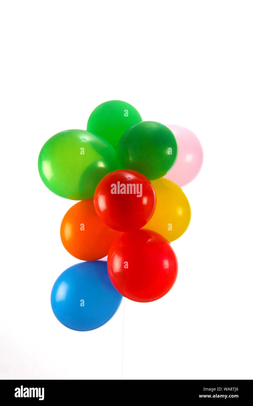 Multi colored helium balloons Stock Photo - Alamy