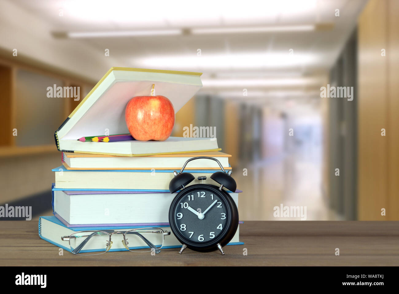 very blurry school hall background and book for education concept Stock ...
