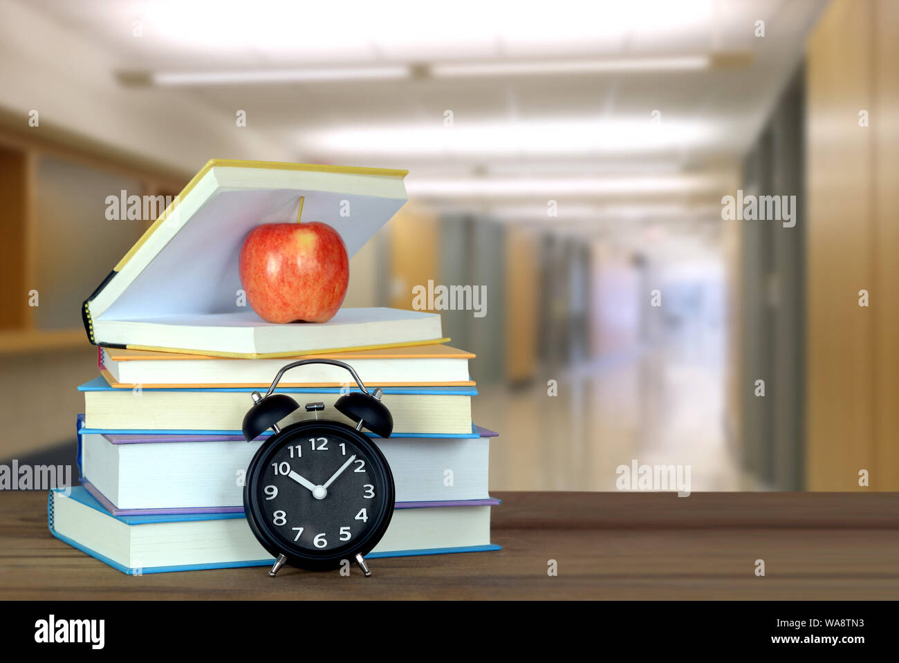 very blurry school hall background and book for education concept Stock ...