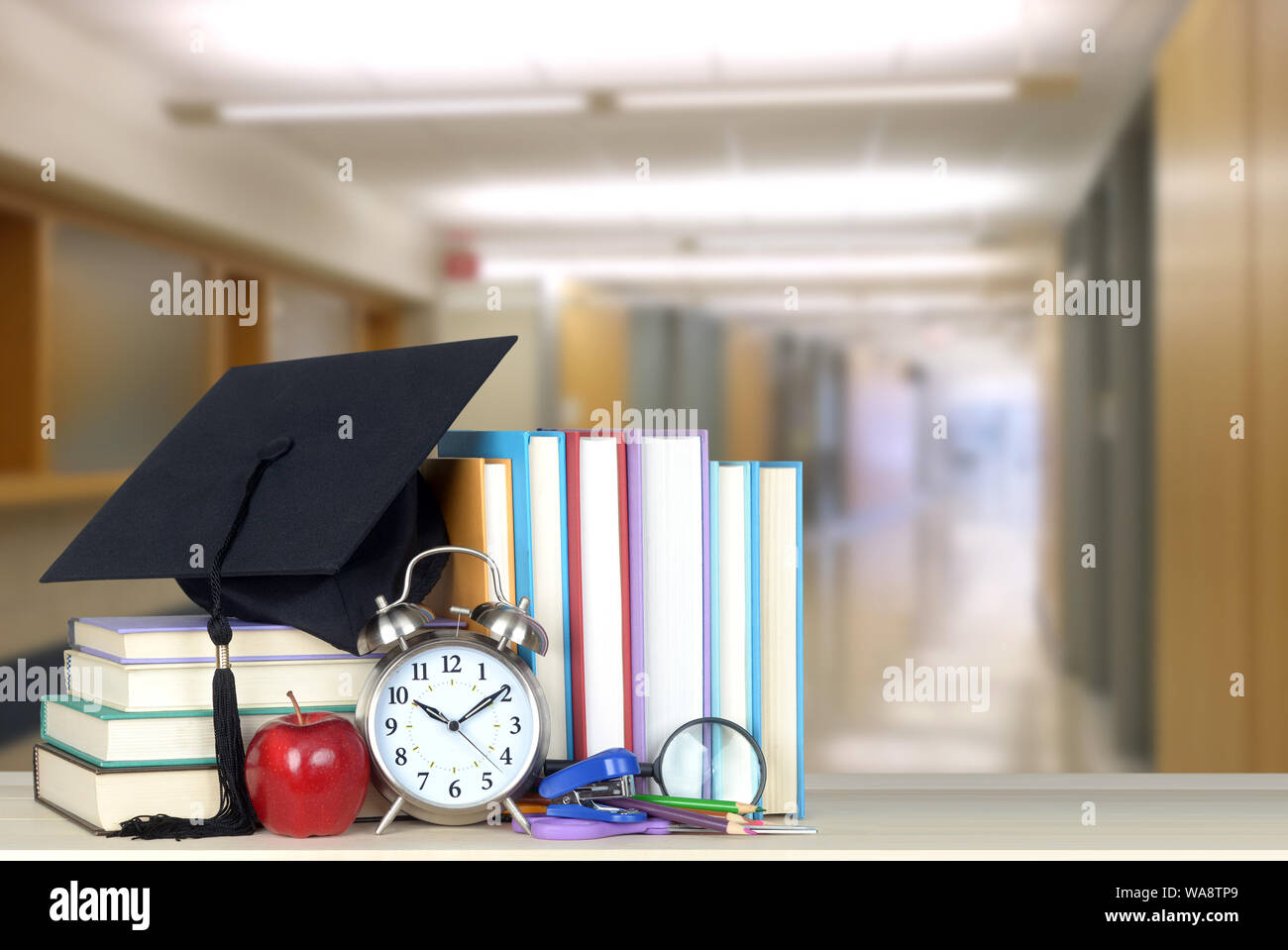very blurry school hall background and book for education concept Stock ...