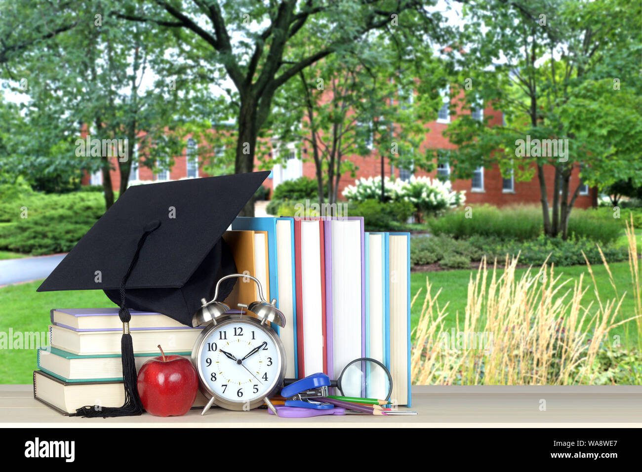 a campus of university in Spring with books for education concept Stock ...