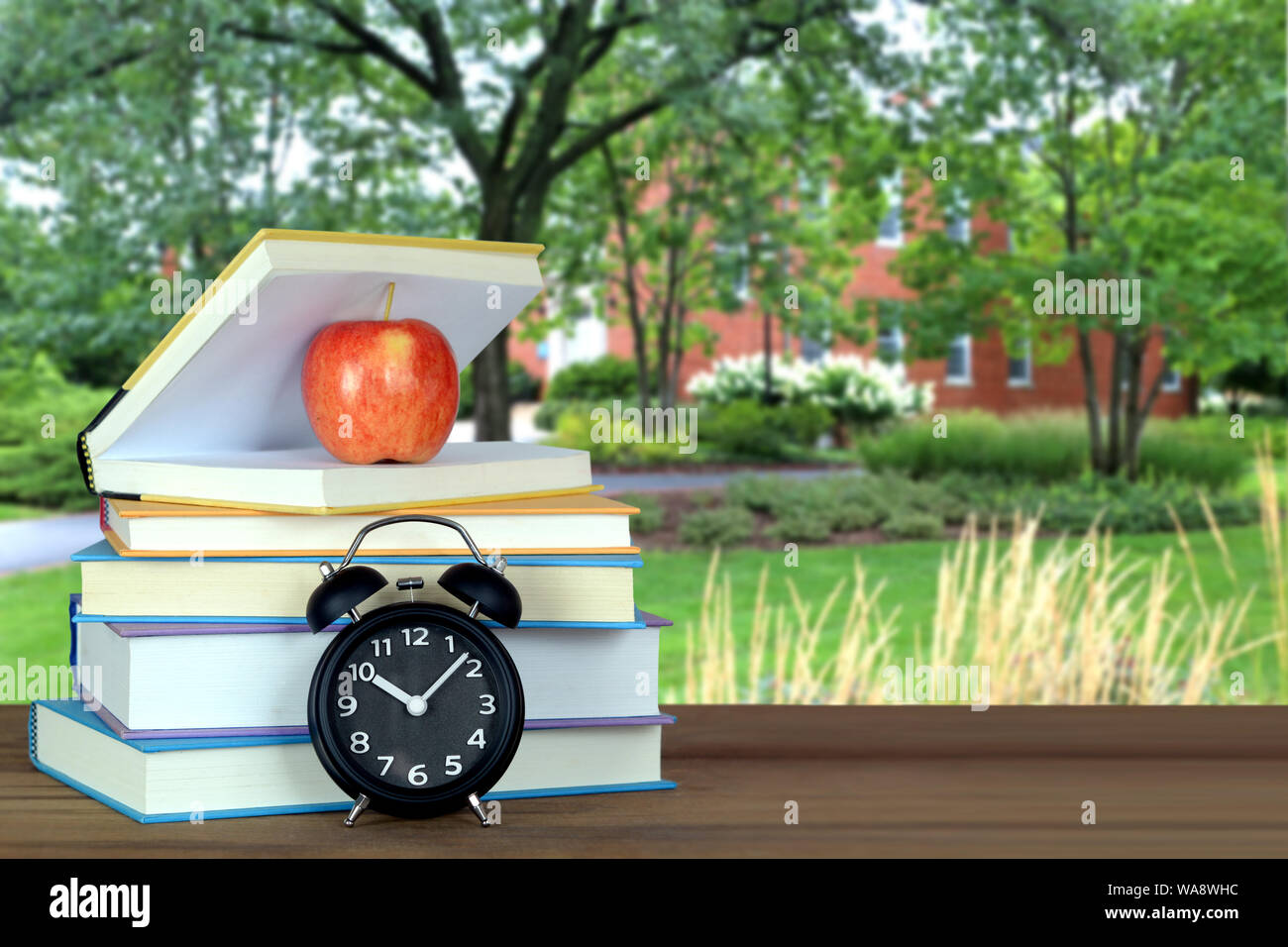 a campus of university in Spring with books for education concept Stock ...