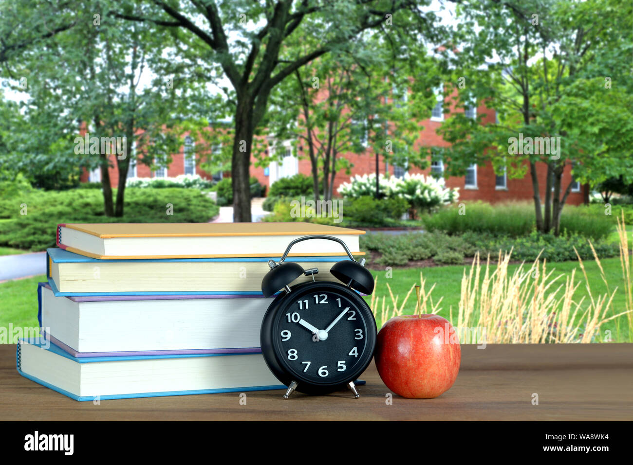 a campus of university in Spring with books for education concept Stock ...