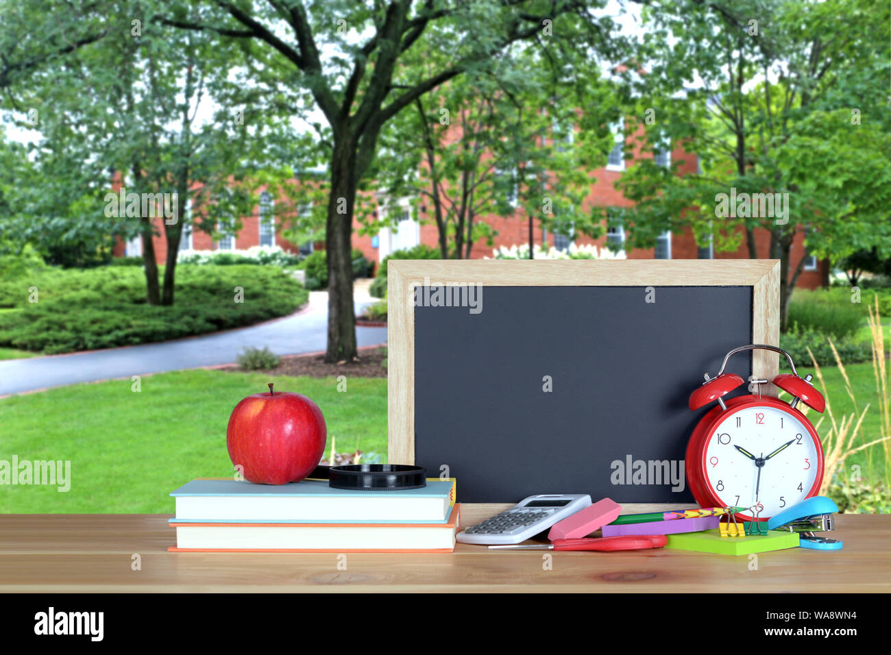 a campus of university in Spring with books for education concept Stock ...