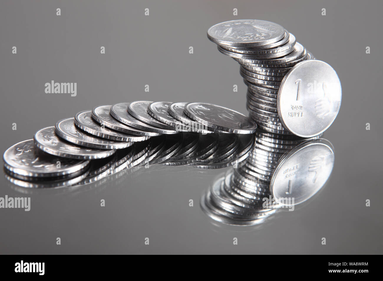 Stacks of Indian coins Stock Photo - Alamy