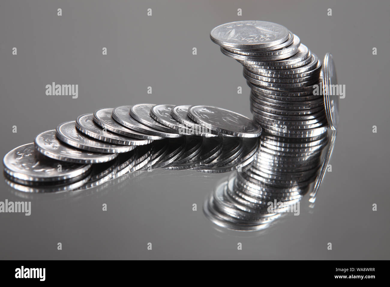 Stacks of Indian coins Stock Photo - Alamy