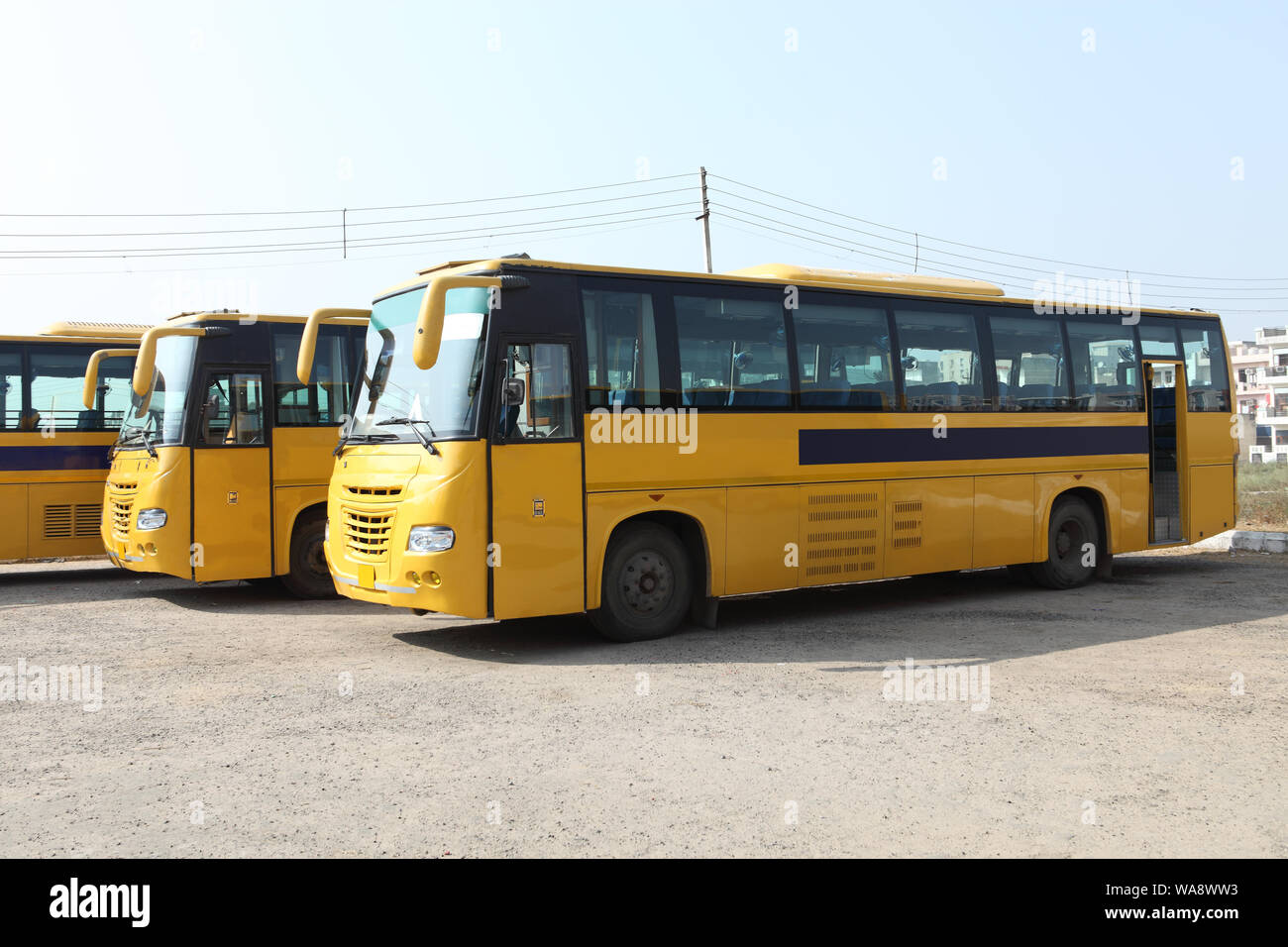 Row of school buses hi-res stock photography and images - Alamy
