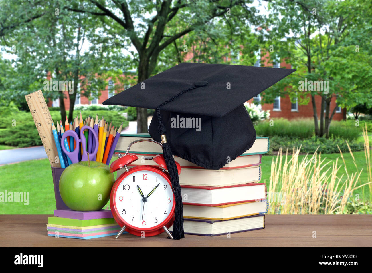a campus of university in Spring with books for education concept Stock ...