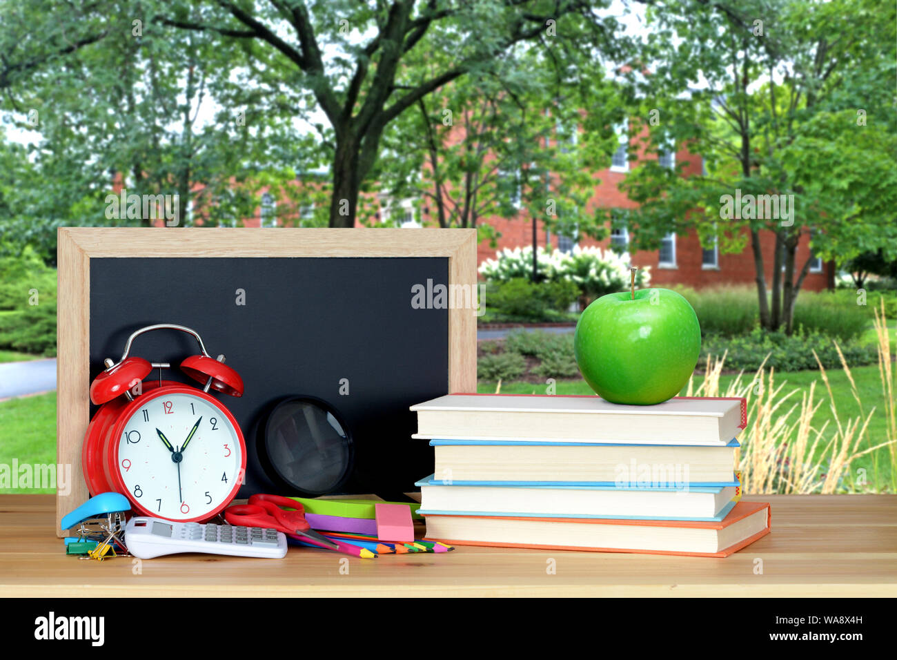 a campus of university in Spring with books for education concept Stock ...
