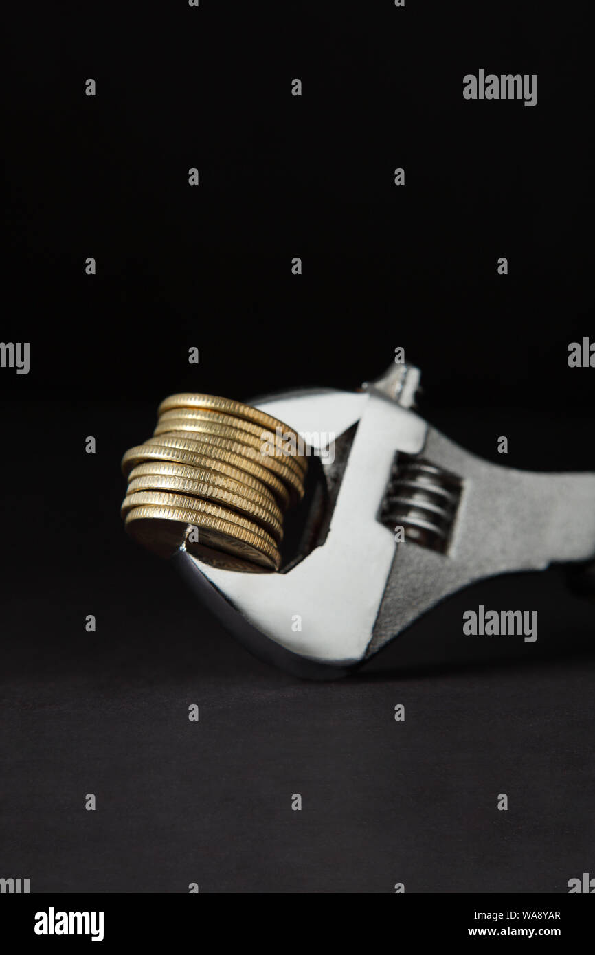 Squeezing money hi-res stock photography and images - Alamy