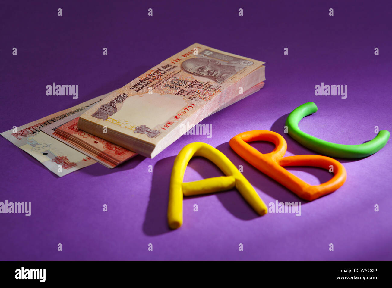 Indian rupees bundle hi-res stock photography and images - Alamy