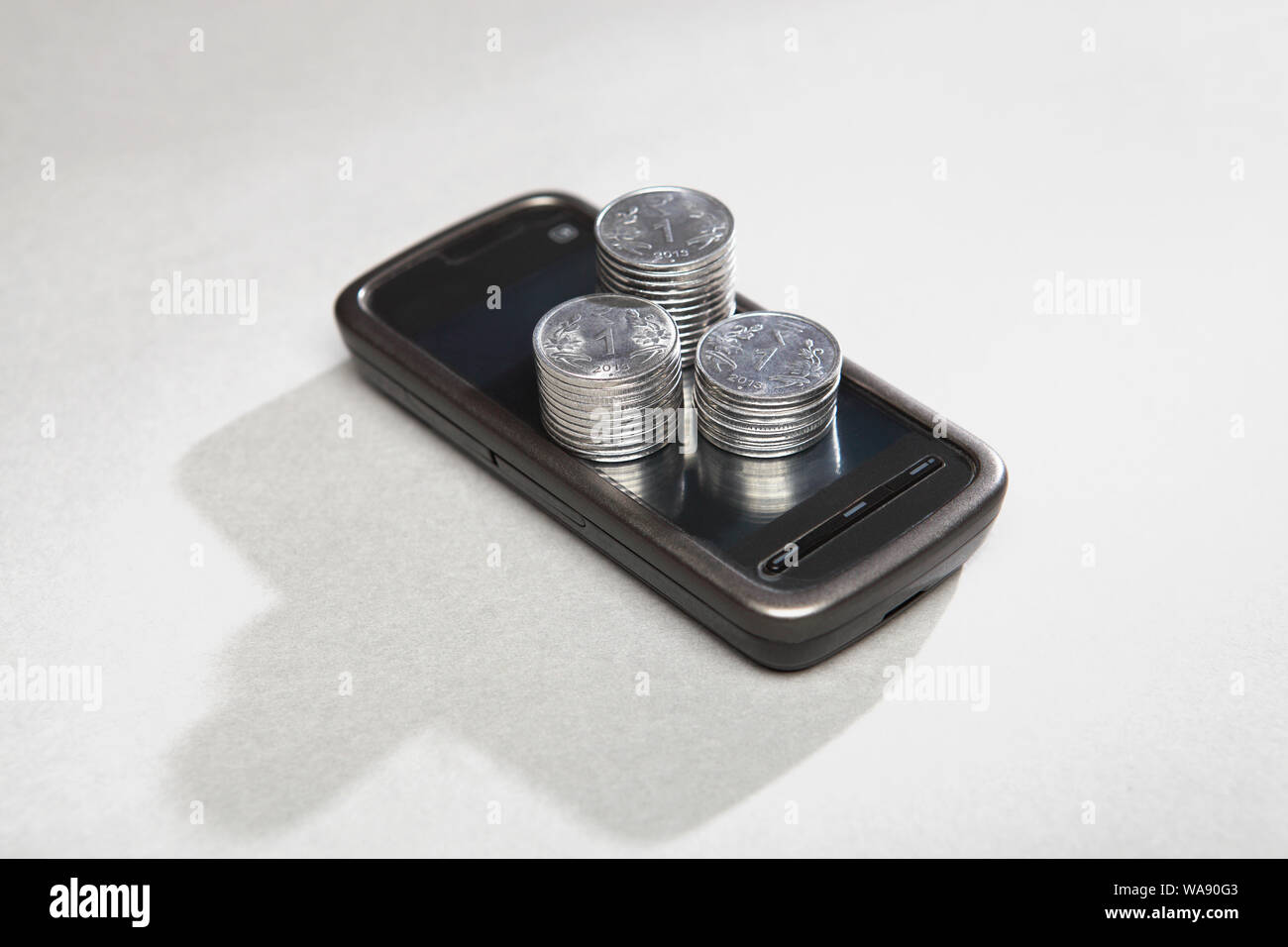 Stack of indian coins hi-res stock photography and images - Alamy