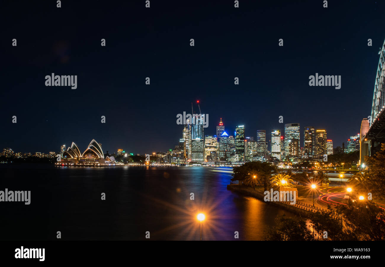 Sydney harbour and skyline with opera house and bridge in view - night ...