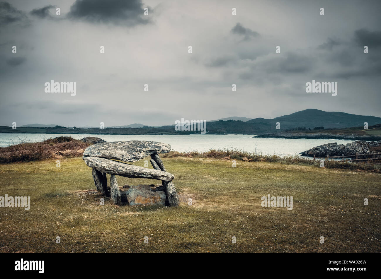 Neolithic wedge tomb at Altar overlooking Toormore Bay in County Cork ...