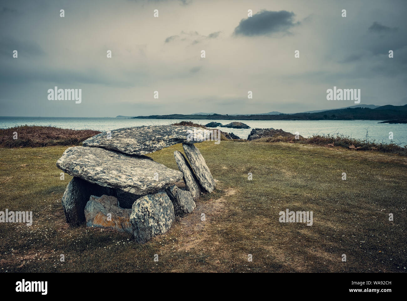 Neolithic wedge tomb at Altar overlooking Toormore Bay in County Cork ...