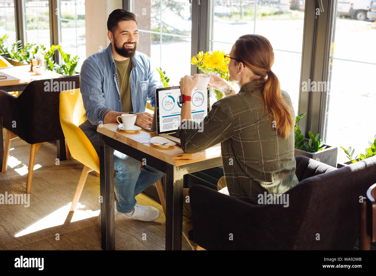 Handsome bearded partners discussion hi-res stock photography and ...