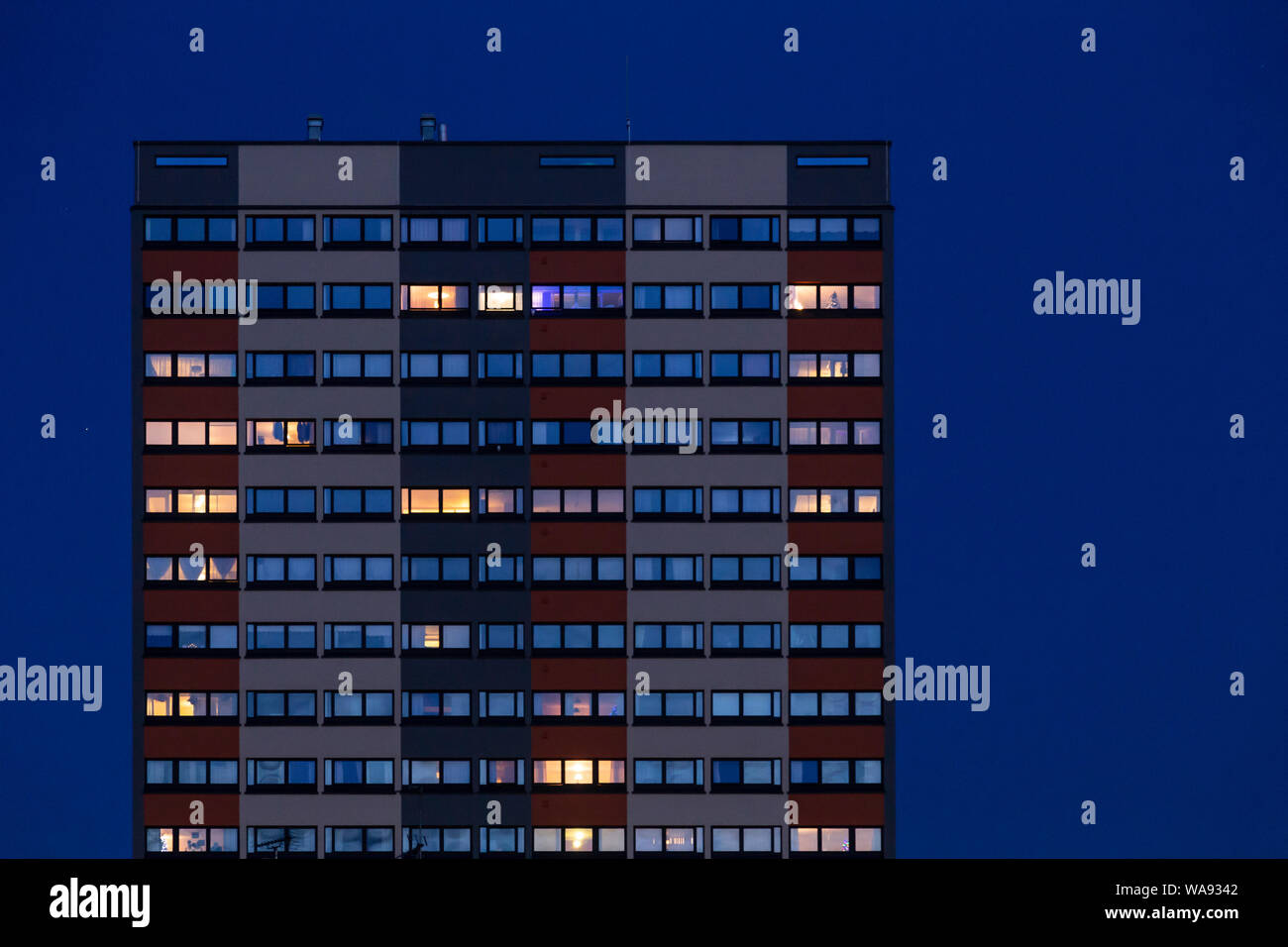 High rise tower block with cladding at night Stock Photo - Alamy