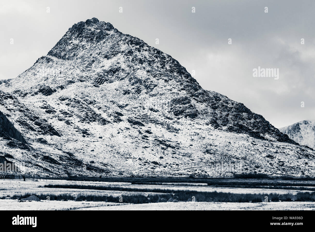 Tryfan mountain in the Glyderau range with snow in winter, Snowdonia ...