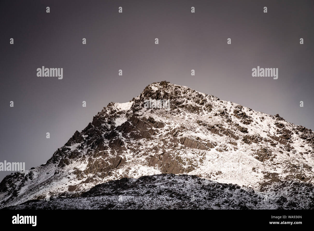 Tryfan mountain in the Glyderau range with snow in winter, Snowdonia ...