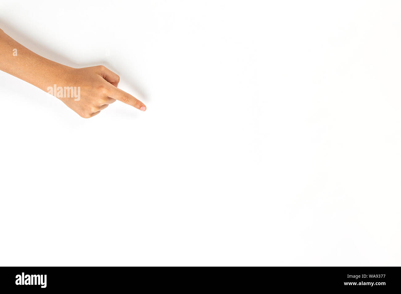 Kid hand pointing with finger to something on white background Stock ...