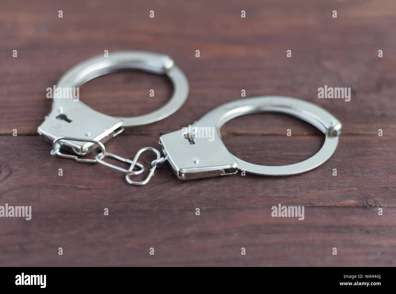 Handcuffs criminal vintage hi-res stock photography and images - Alamy