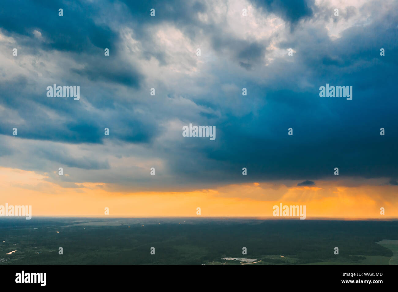 Aerial View. Sunset Sky Above Green Forest Landscape In Sunny Evening ...