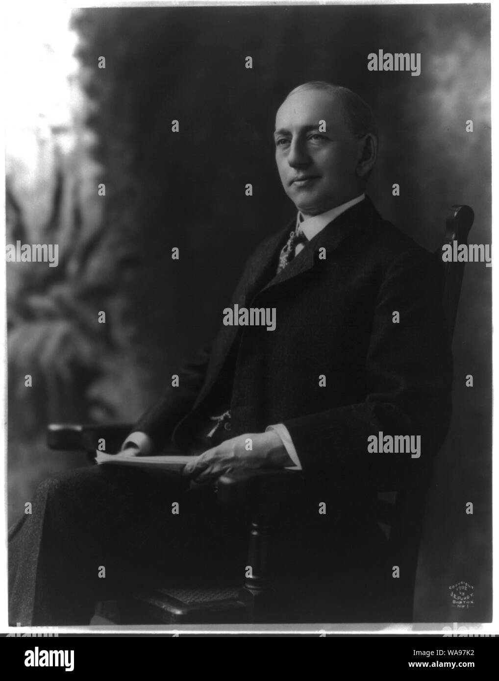 Charles Quincy Tirrell, 1844-1910; three-quarters length, seated Stock ...