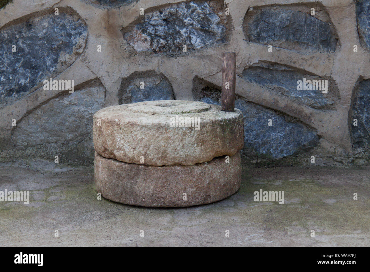 stone hand mill for wheat, corn grains Stock Photo - Alamy