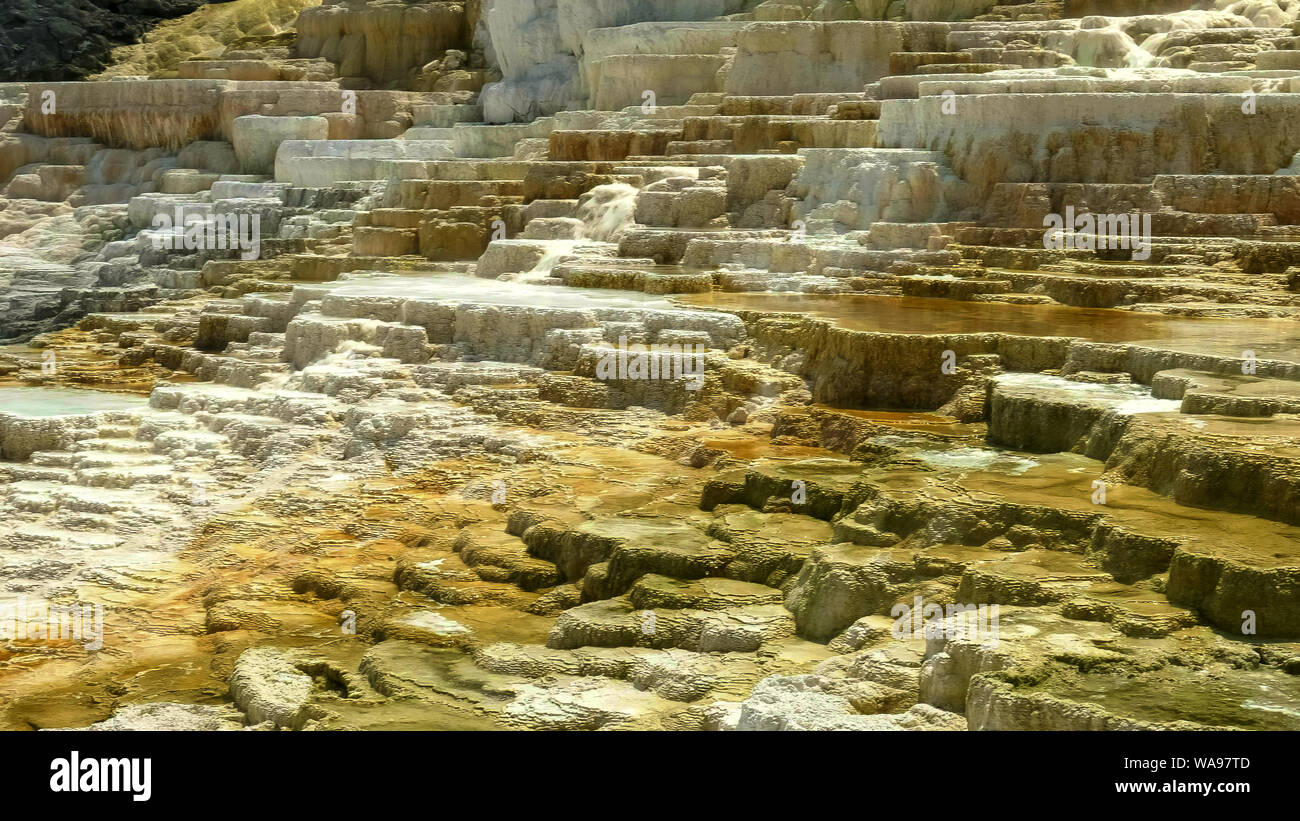midday shot of mound spring in yellowstone Stock Photo - Alamy