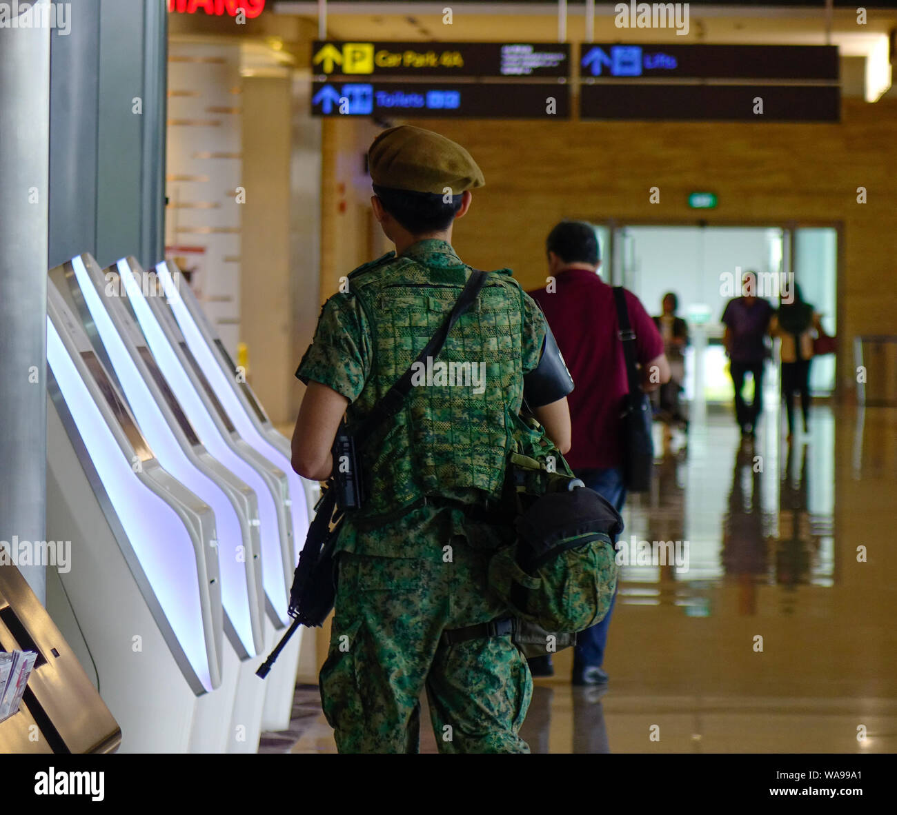 Singapore - Mar 27, 2019. A soldier is on duty in Changi Airport (SIN ...