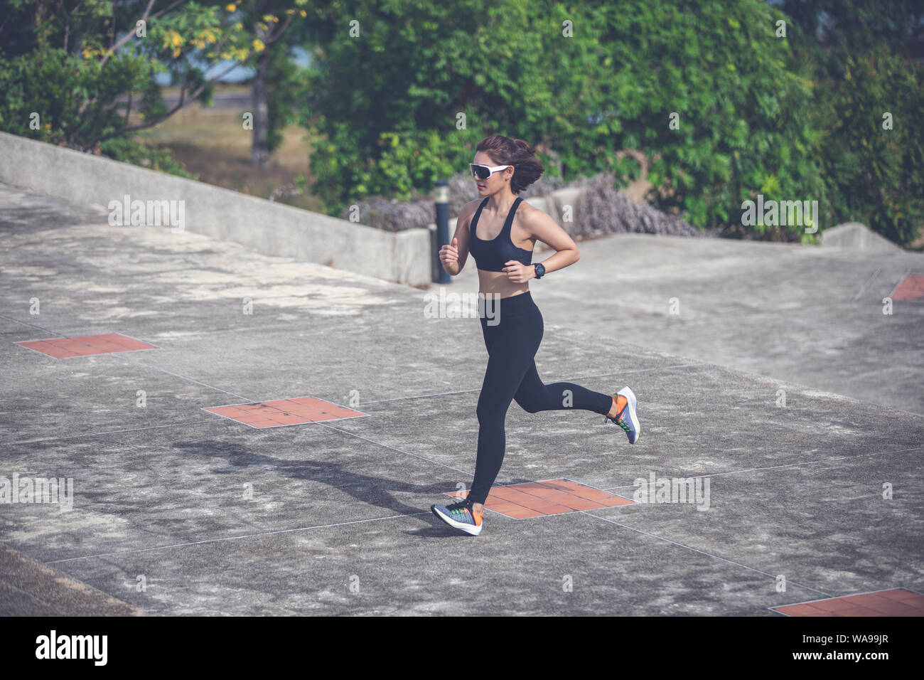 Asian women Running and jogging during outdoor on city run Stock Photo ...