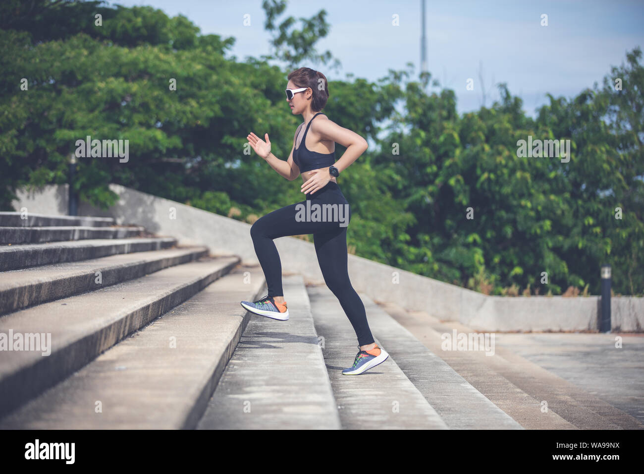 Asian women Running and jogging during outdoor on city run Stock Photo ...