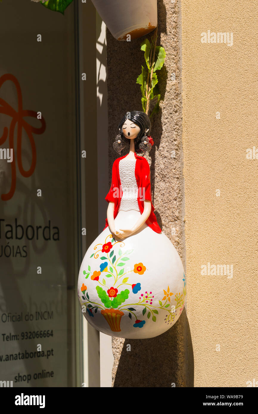 Portugal Oporto Porto suspended flower pot lady Stock Photo - Alamy