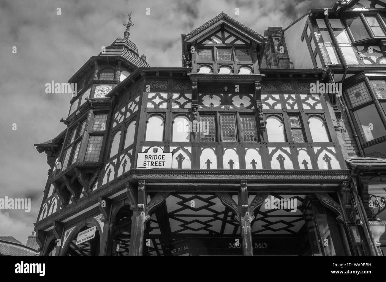 Black and White timbered building on the cross Bridge Street, Chester ...
